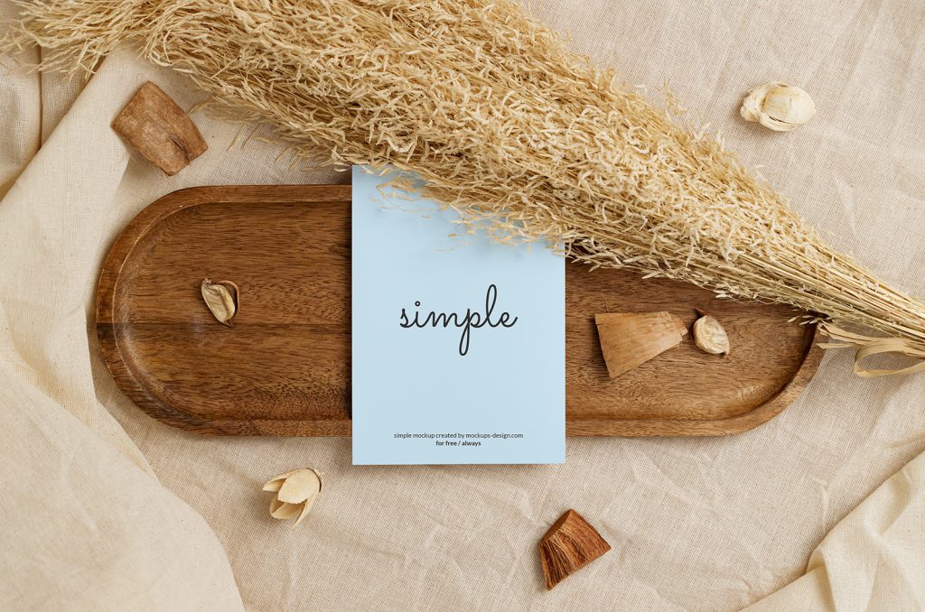 Free A6 flyer on wooden tray mockup - Mockups Design
