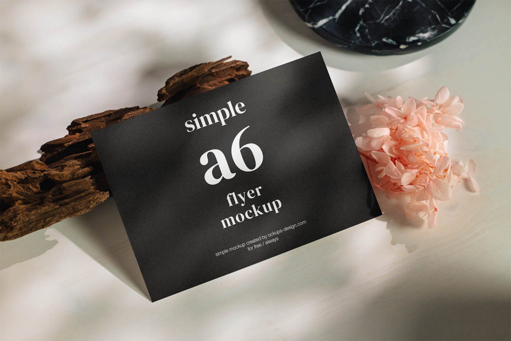 A6 flyer on white planks mockup - Mockups Design