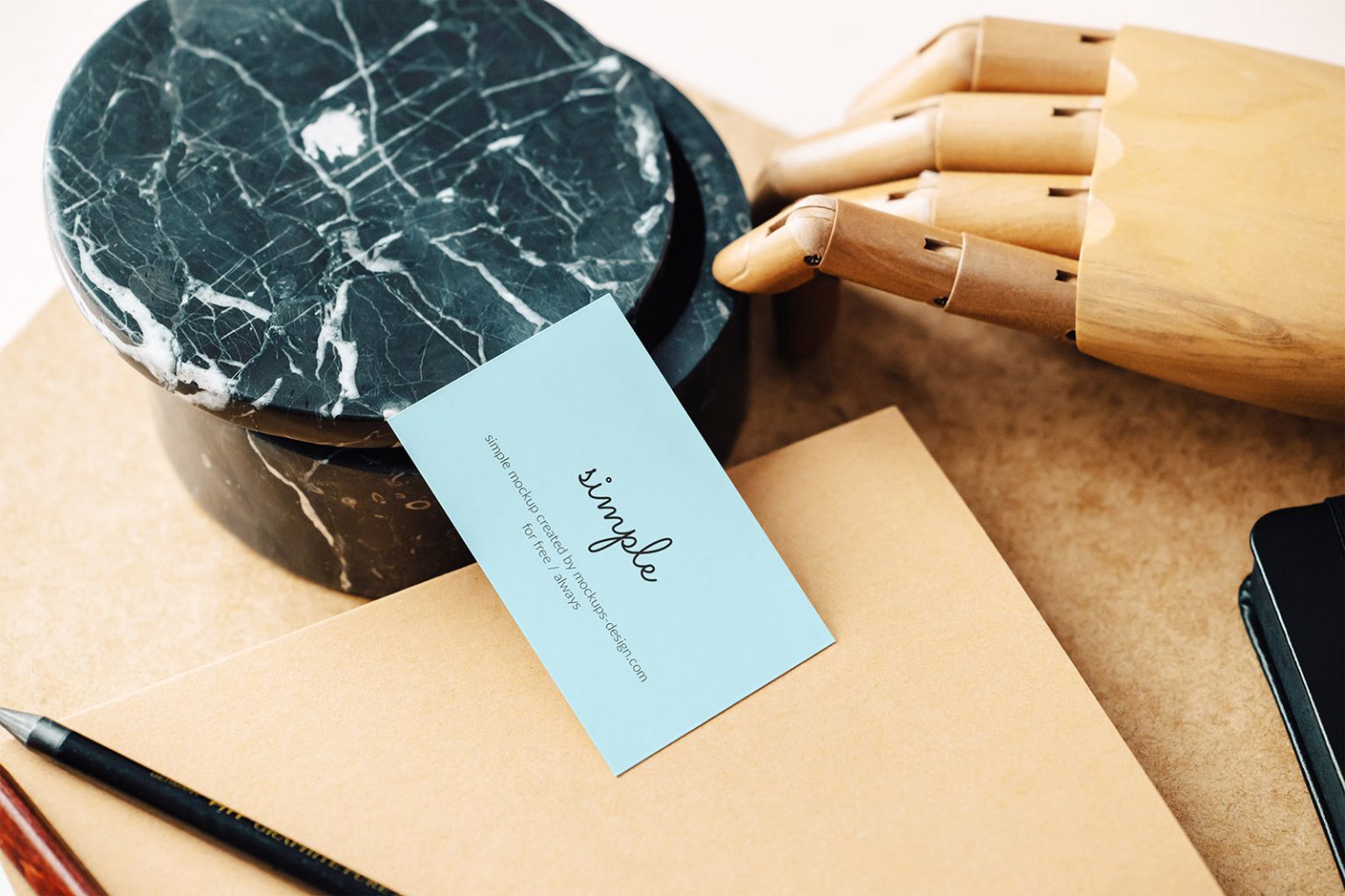 Business card on the notepad - Mockups Design