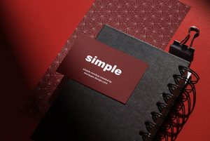 Business card on the black notepad - Mockups Design