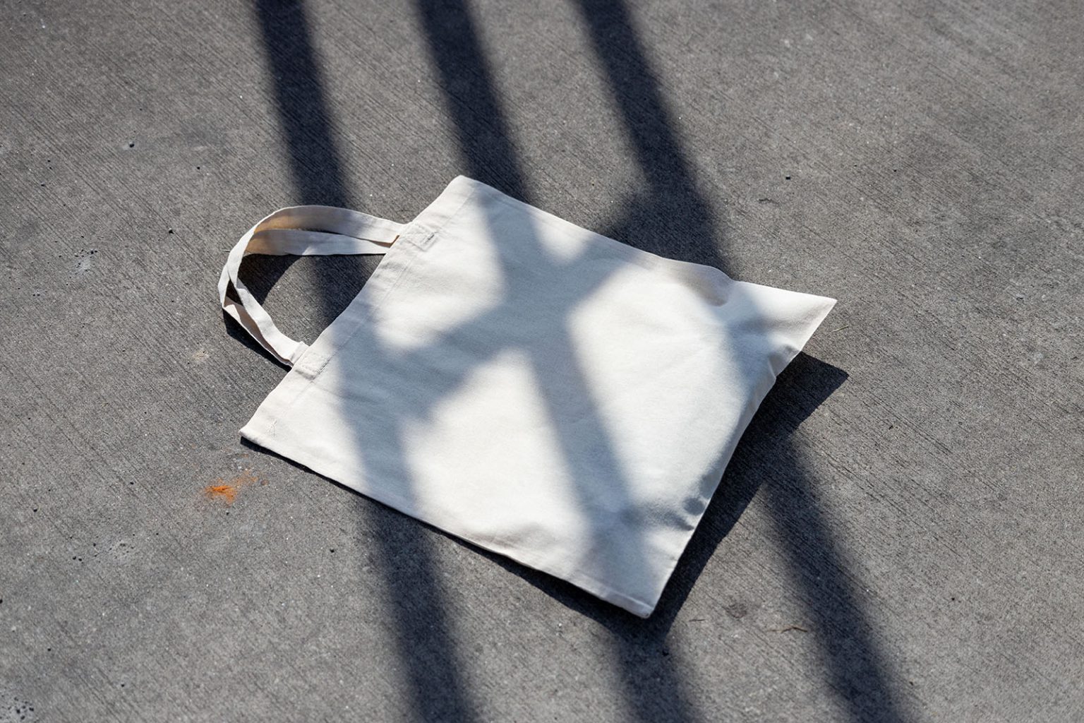 Tote bag on the ground mockup - Mockups Design